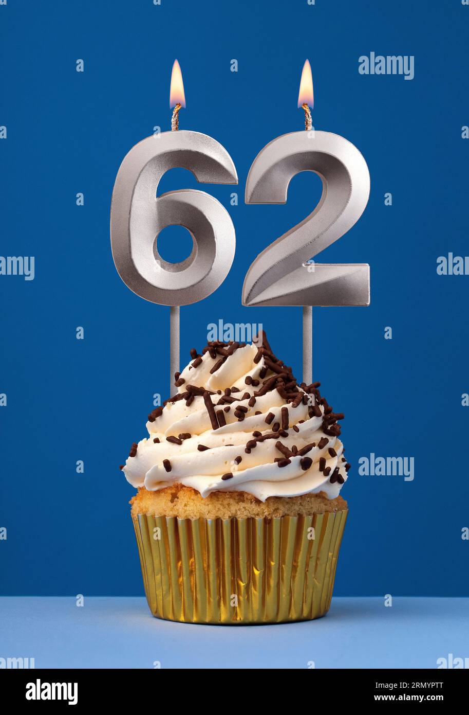 Vertical birthday card with cake - Lit candle number 62 on blue ...