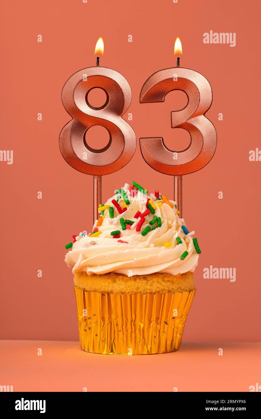 Birthday cake with candle number 83 - Coral fusion background Stock ...