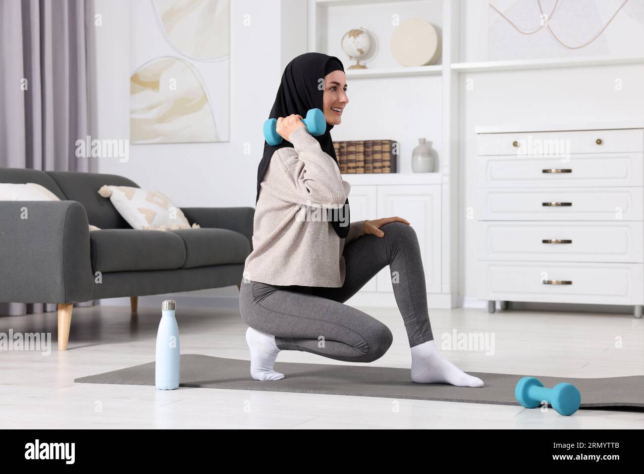 Woman wearing hijab exercise hi-res stock photography and images - Alamy