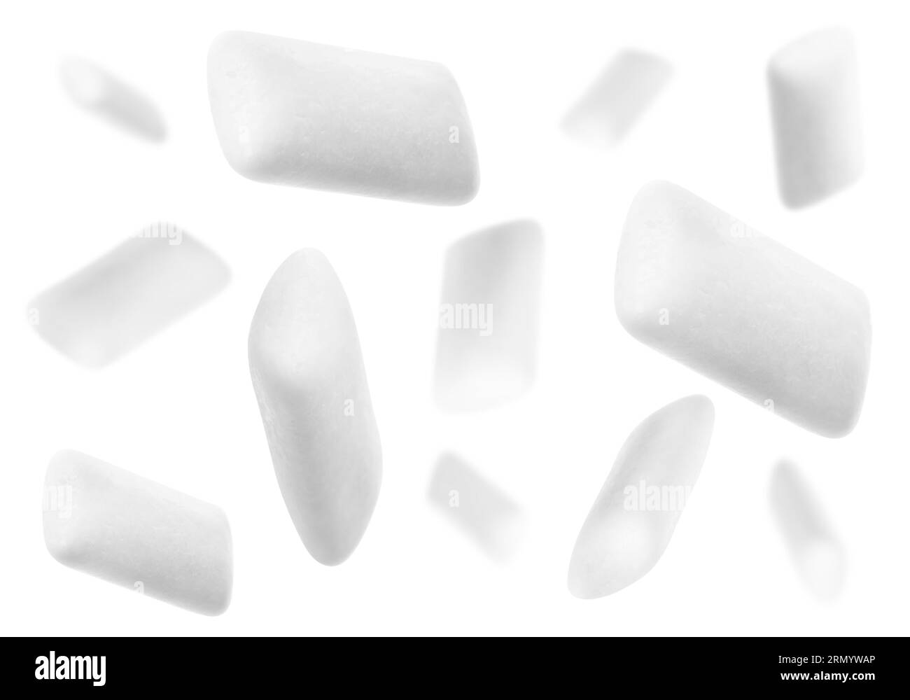 Many chewing gum pads falling on white background Stock Photo - Alamy