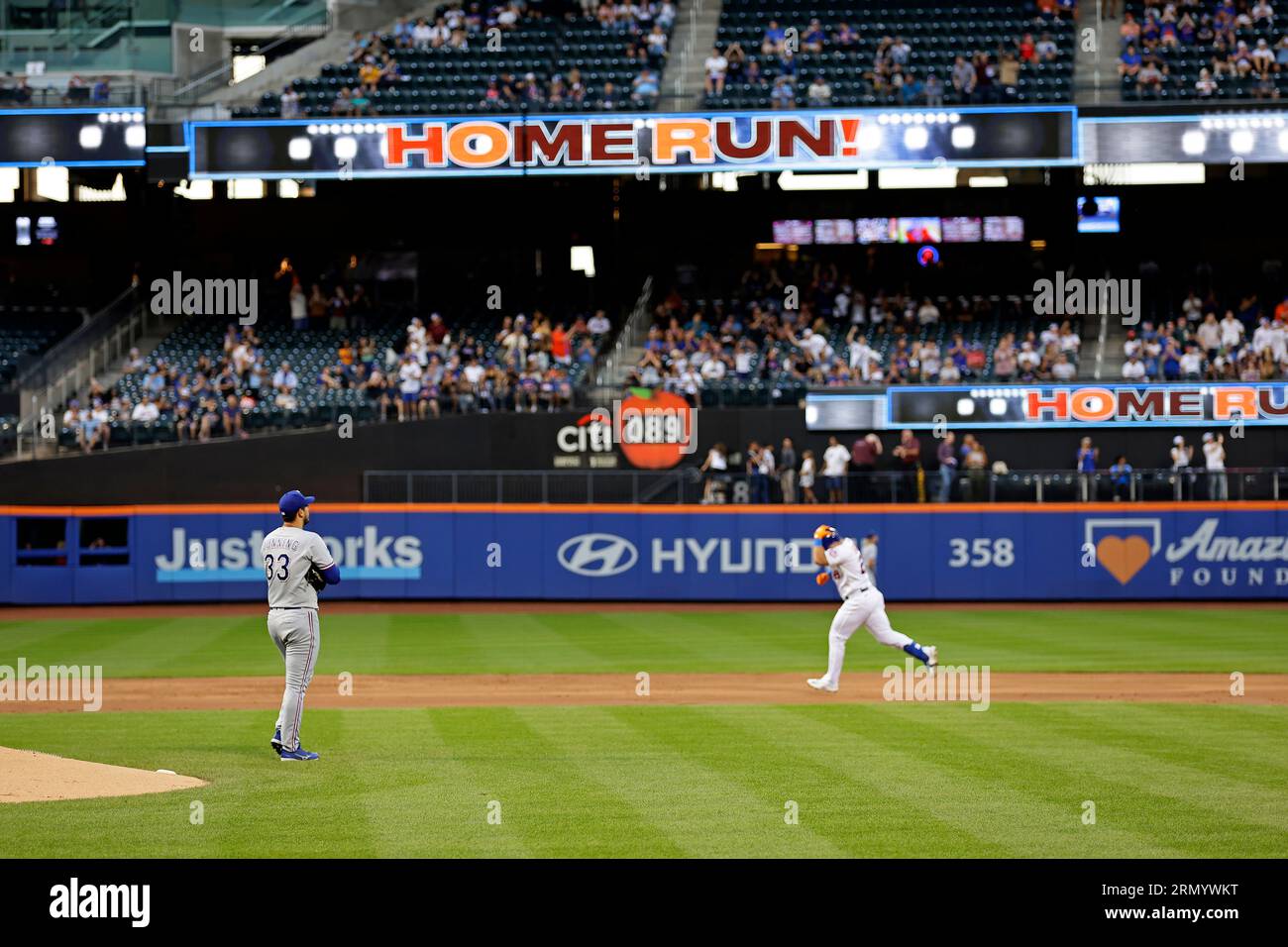 Texas Rangers pitcher Dane Dunning (33) reacts after giving up a home ...