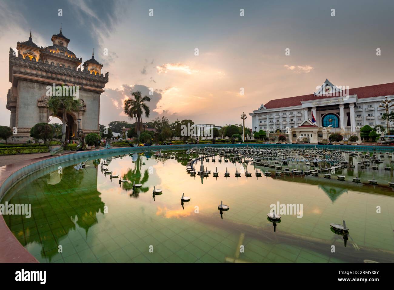 In Patuxay Park,next to the iconic capital city landmark and war ...