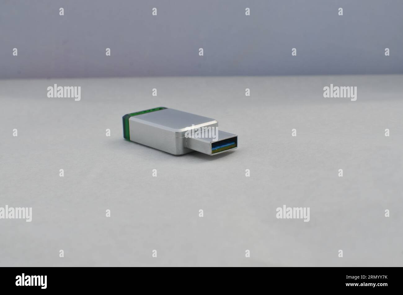 Aluminum flash drive close-up, modern and sturdy USB storage stick ...