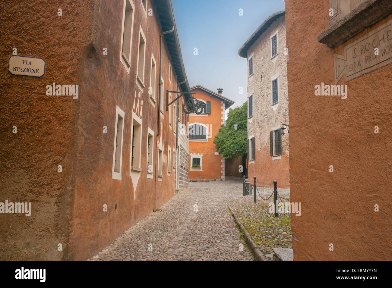 Typical European stone path in lane from Via Stazione leading to orange ...