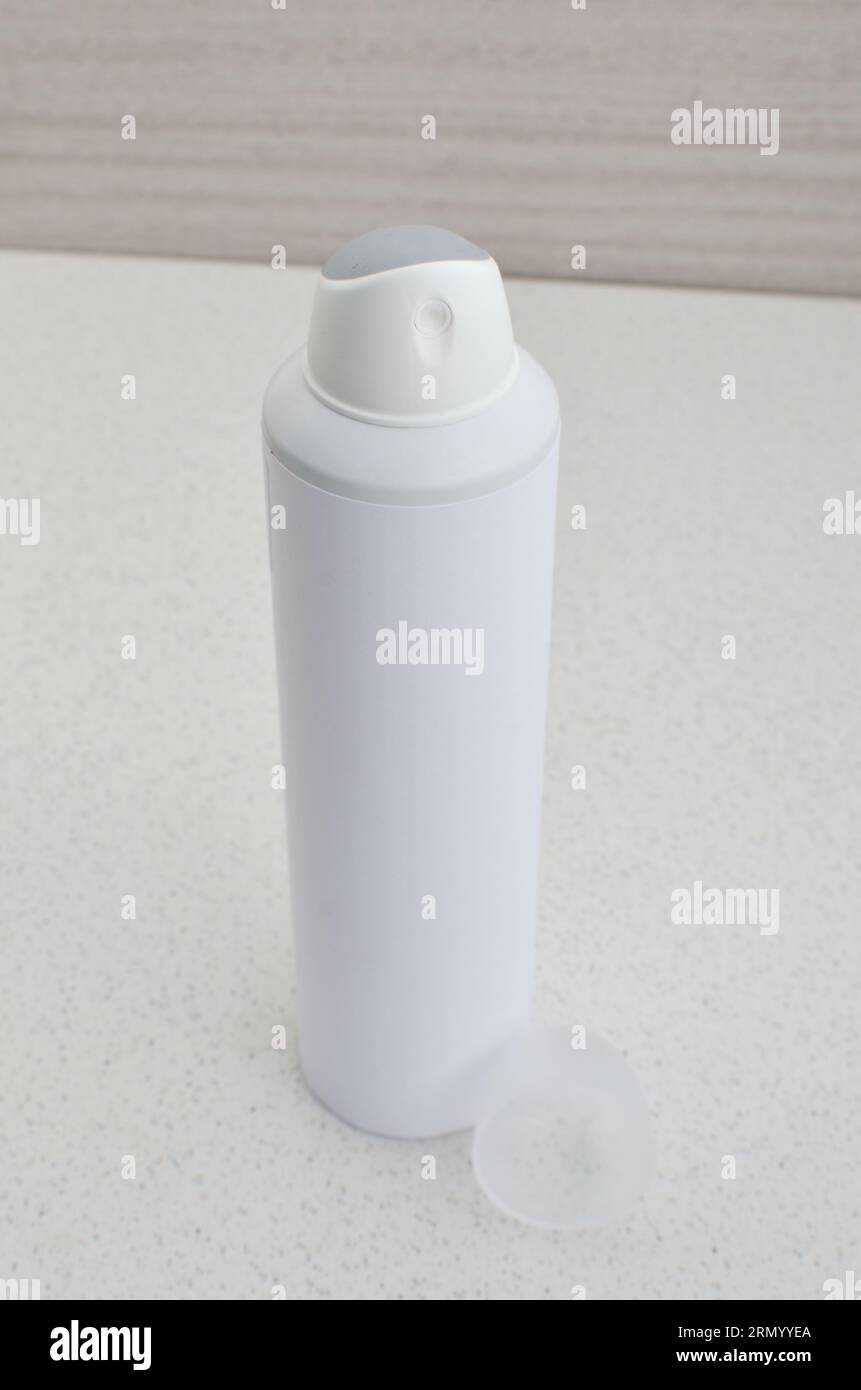 Close-up of spray deodorant with white label, conveying concepts of ...