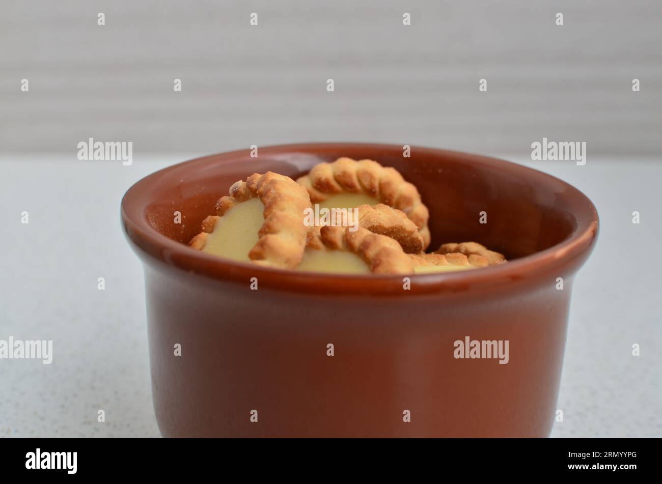 Close-up of delicious biscuits in the form of tartlets filled with ...