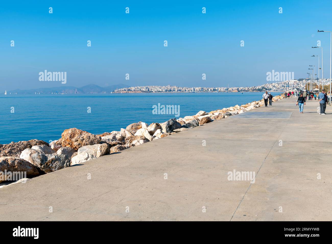The seafront pedestrian boardwalk and promenade along the Athenian ...