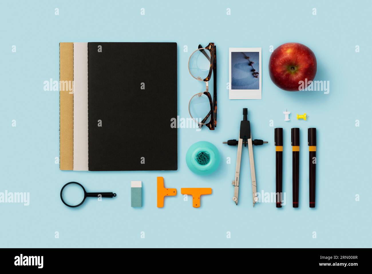 Back to school flat lays on blue background. School supplies desktop ...