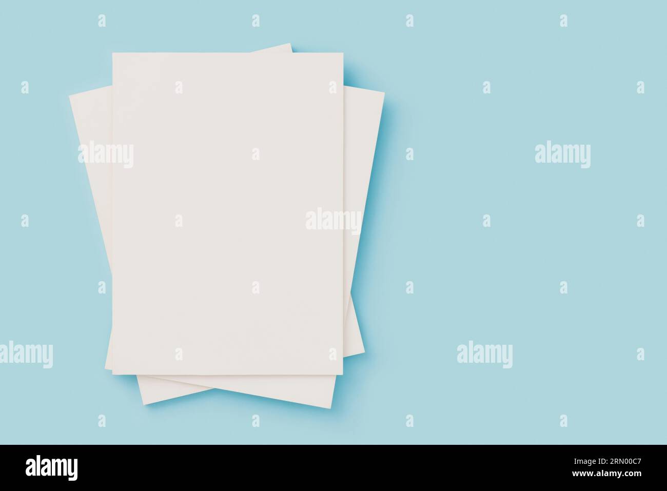 White blank cover magazine stack, mockup on blue background with copy ...