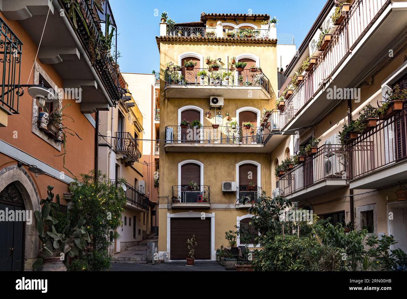 View of a beautiful town of Taormina in Sicily. Architecture of ...