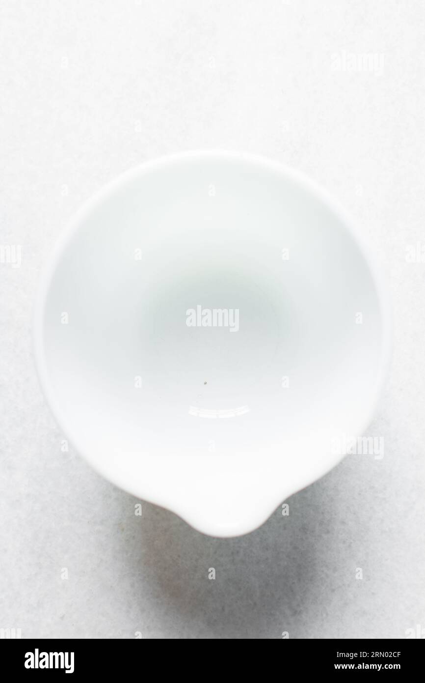 Top view of ceramic bowl on a marble table, white ceramic mixing bowl ...