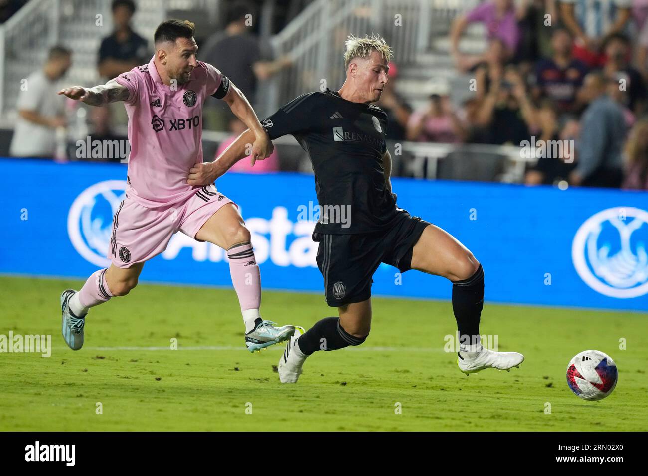 Nashville SC defender Lukas MacNaughton (3) defends Inter Miami forward ...