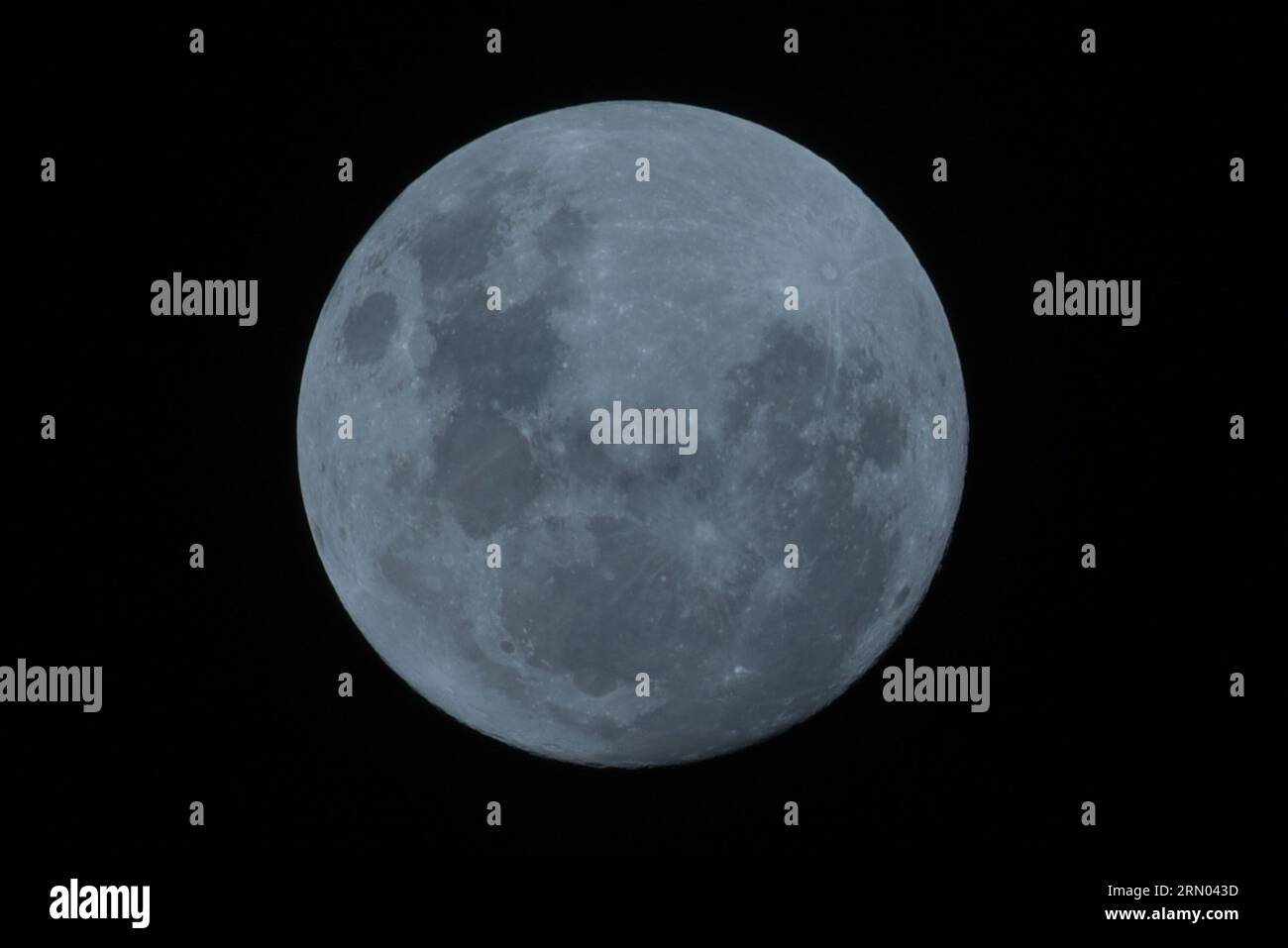 An attractive stunning view of the incredible rare super Blue Moon on ...