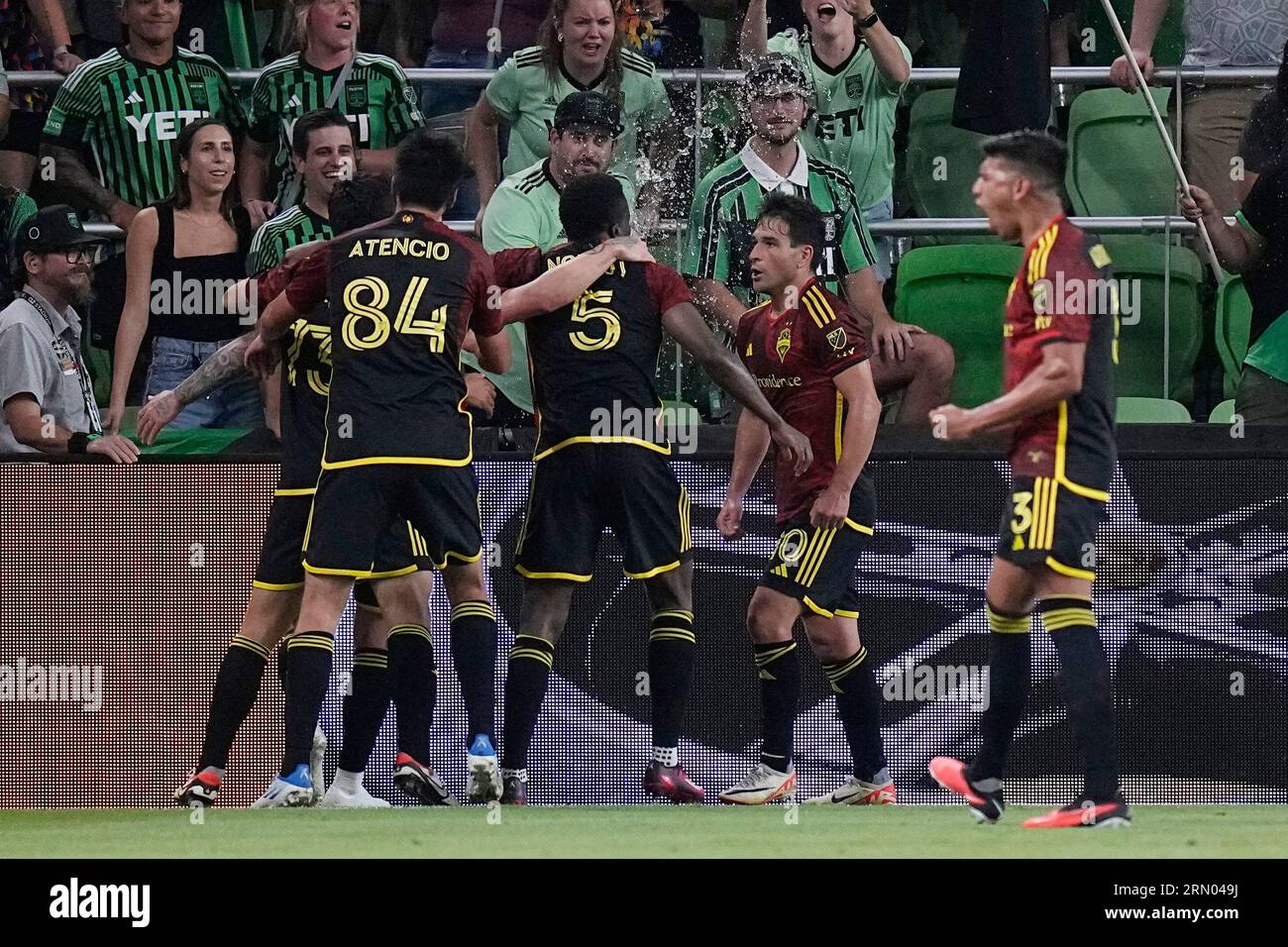 Seattle Sounders FC defender Nouhou Tolo (5) celebrates with teammates ...