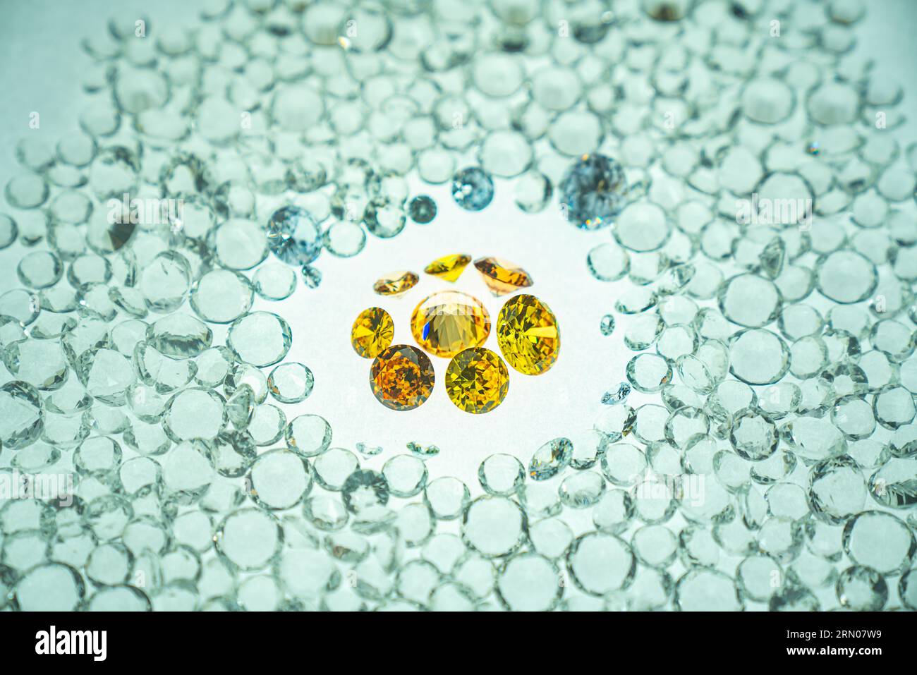 A group of yellow diamonds arranged in the middle of white diamonds in ...