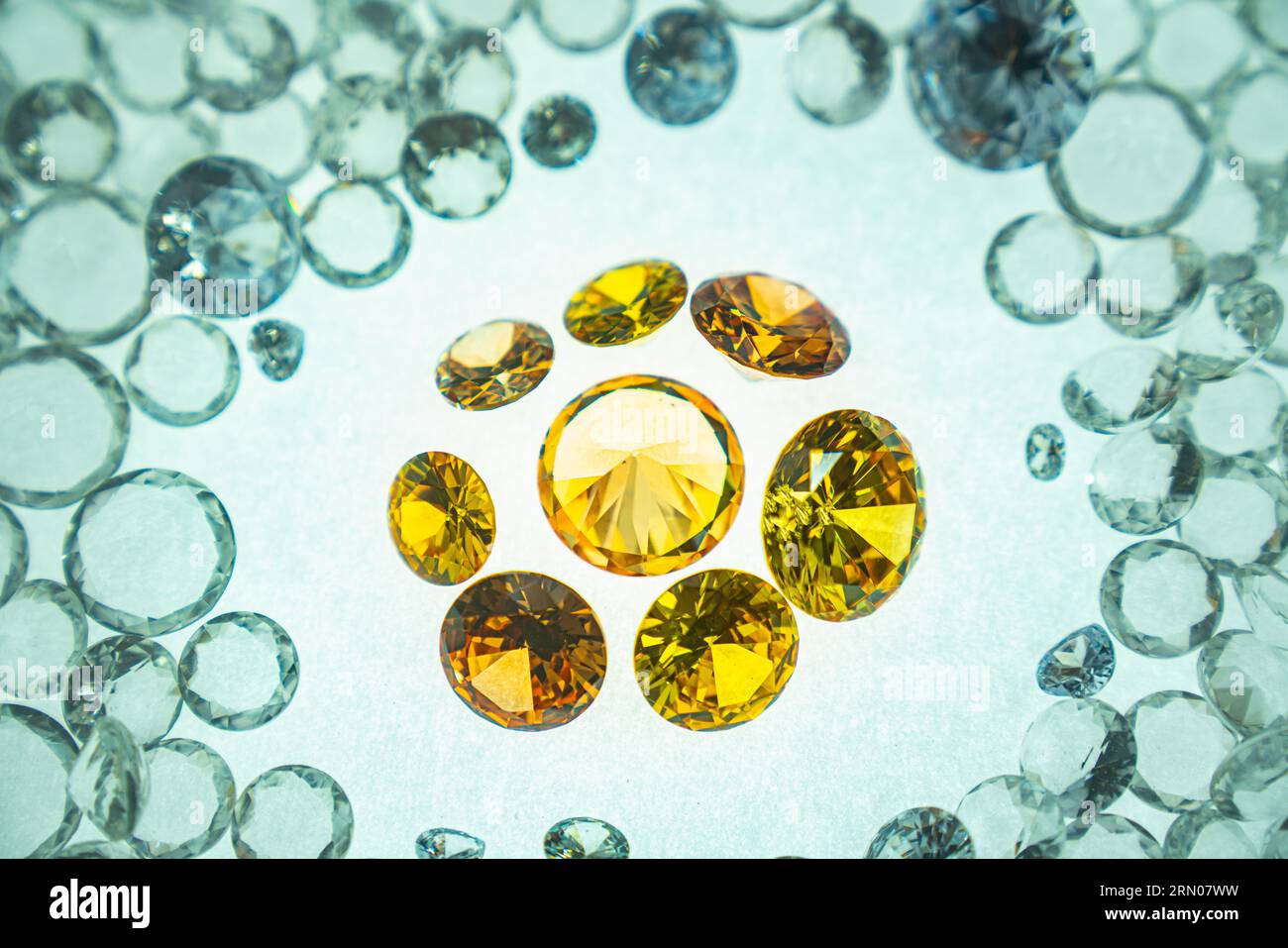A group of yellow diamonds arranged in the middle of white diamonds in ...