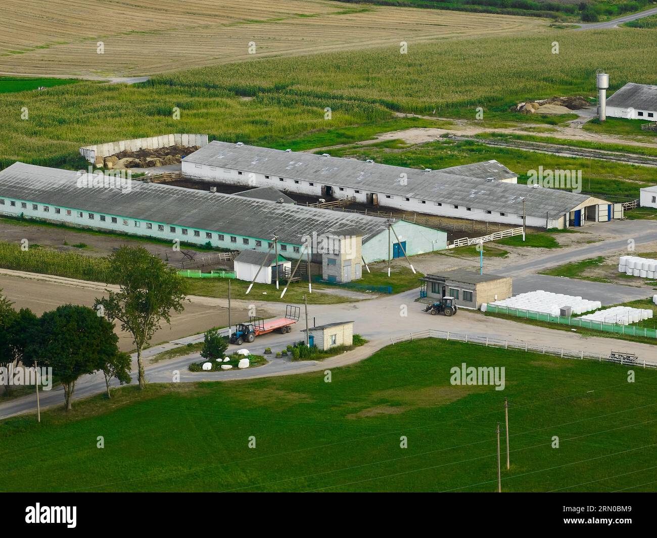Countryside farming surrounded by planted fields with crops Stock Photo ...