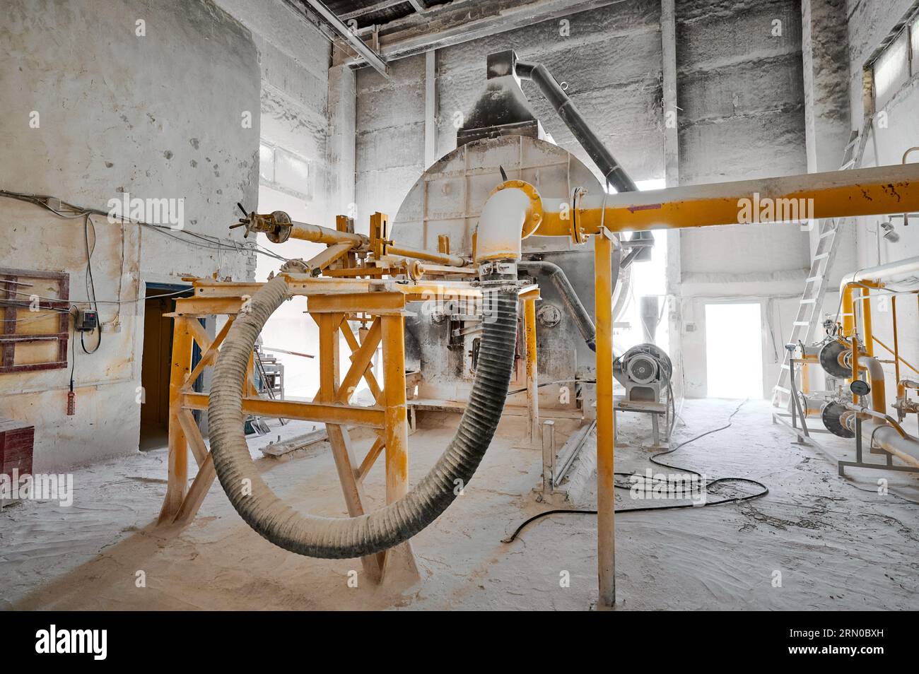 Fuel burning device of rotary kiln at manufacturing complex Stock Photo ...