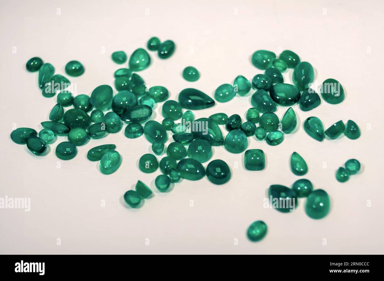 Green Emeralds From Muzo Coscuez And Chivor Colombia Isolated On