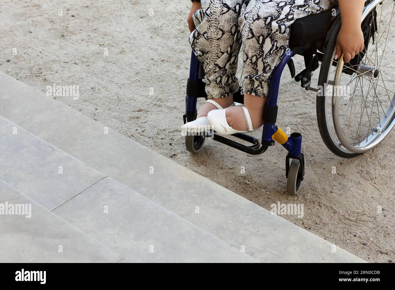 Cropped Young Disabled Adult Woman In Wheelchair In Front Of Stair On ...