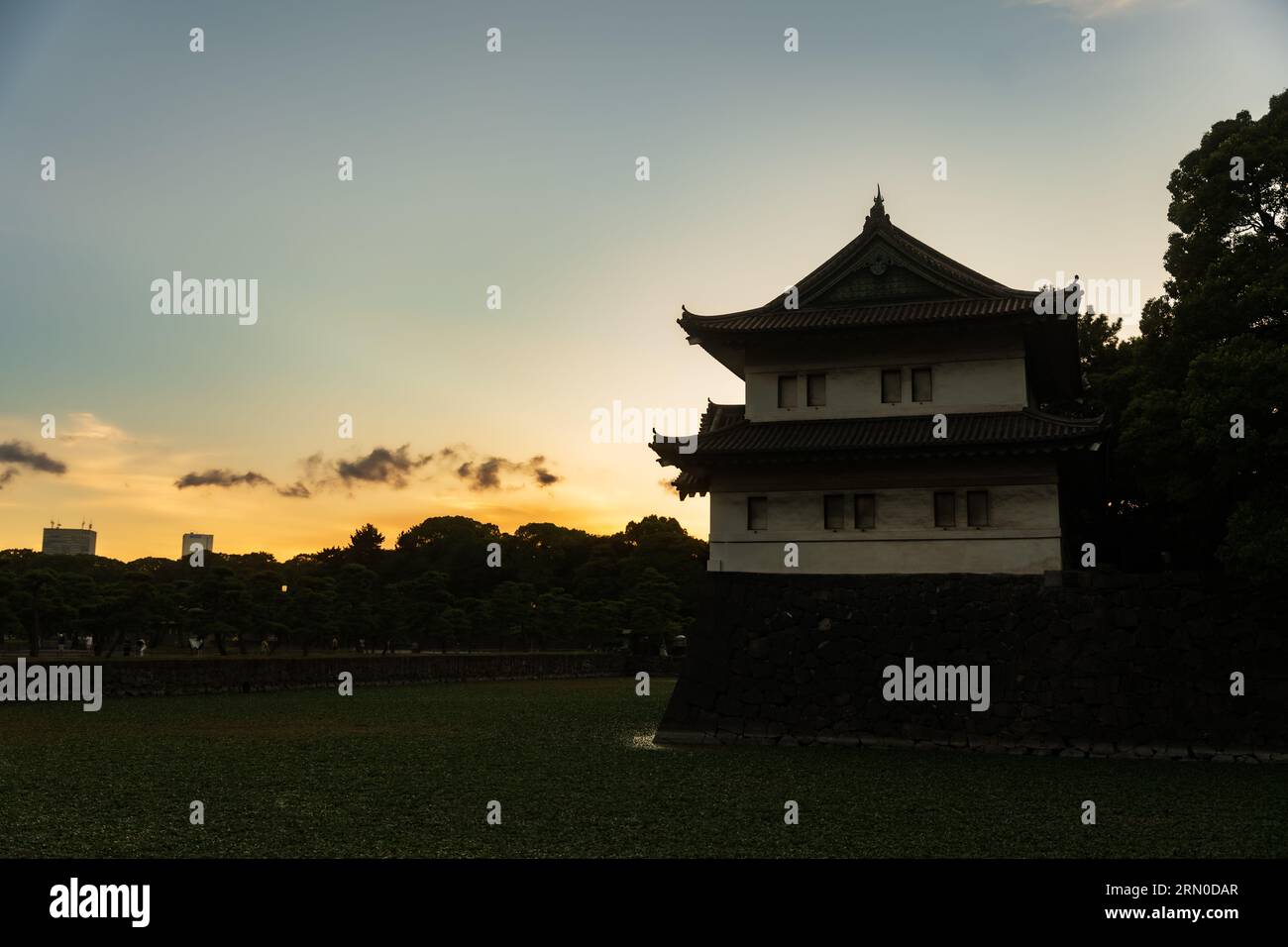 Tokyo Imperial Palace photographed at sunset. Beautiful sky over the ...