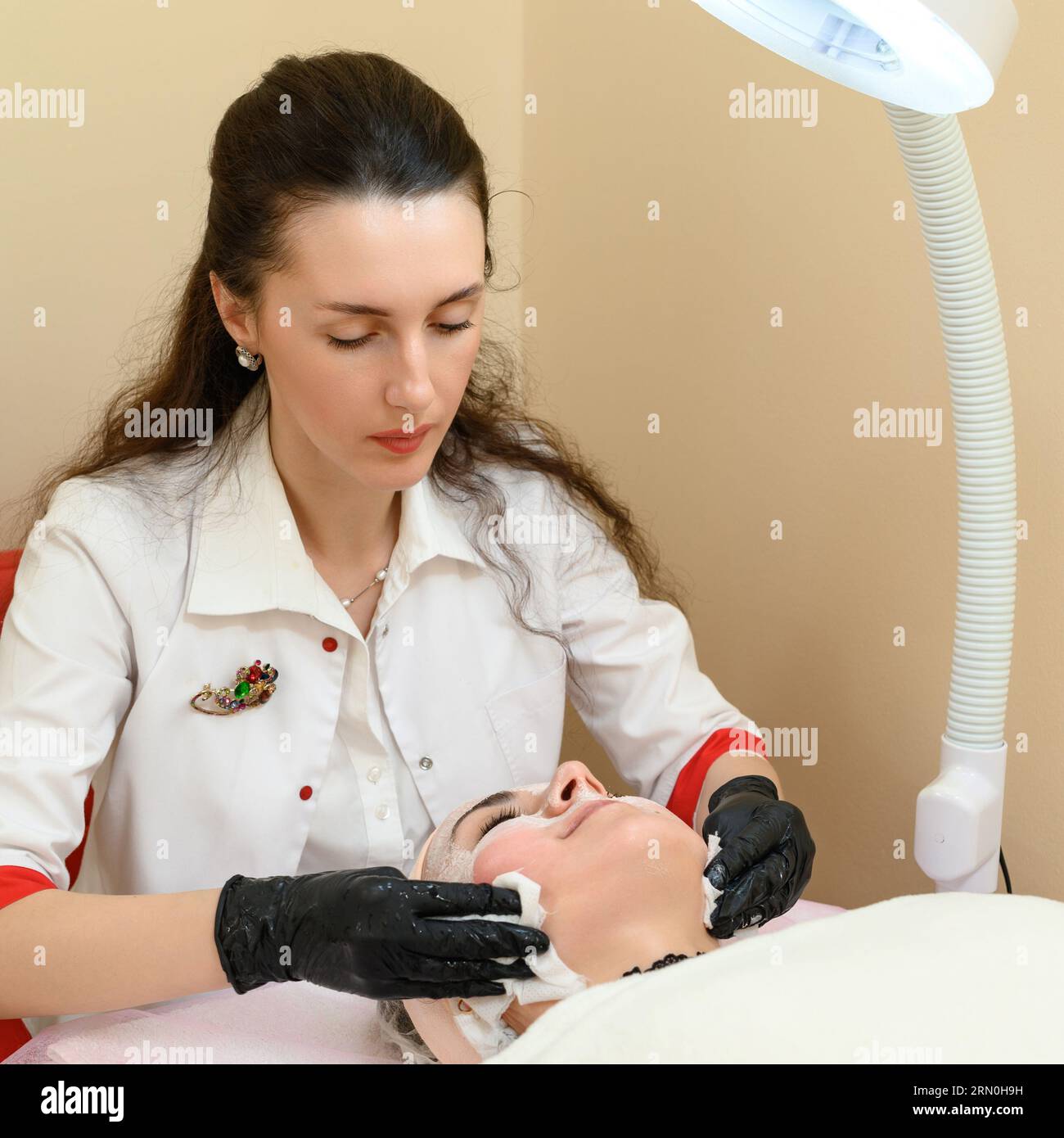 The procedure of washing a girl by a beautician before or after the ...