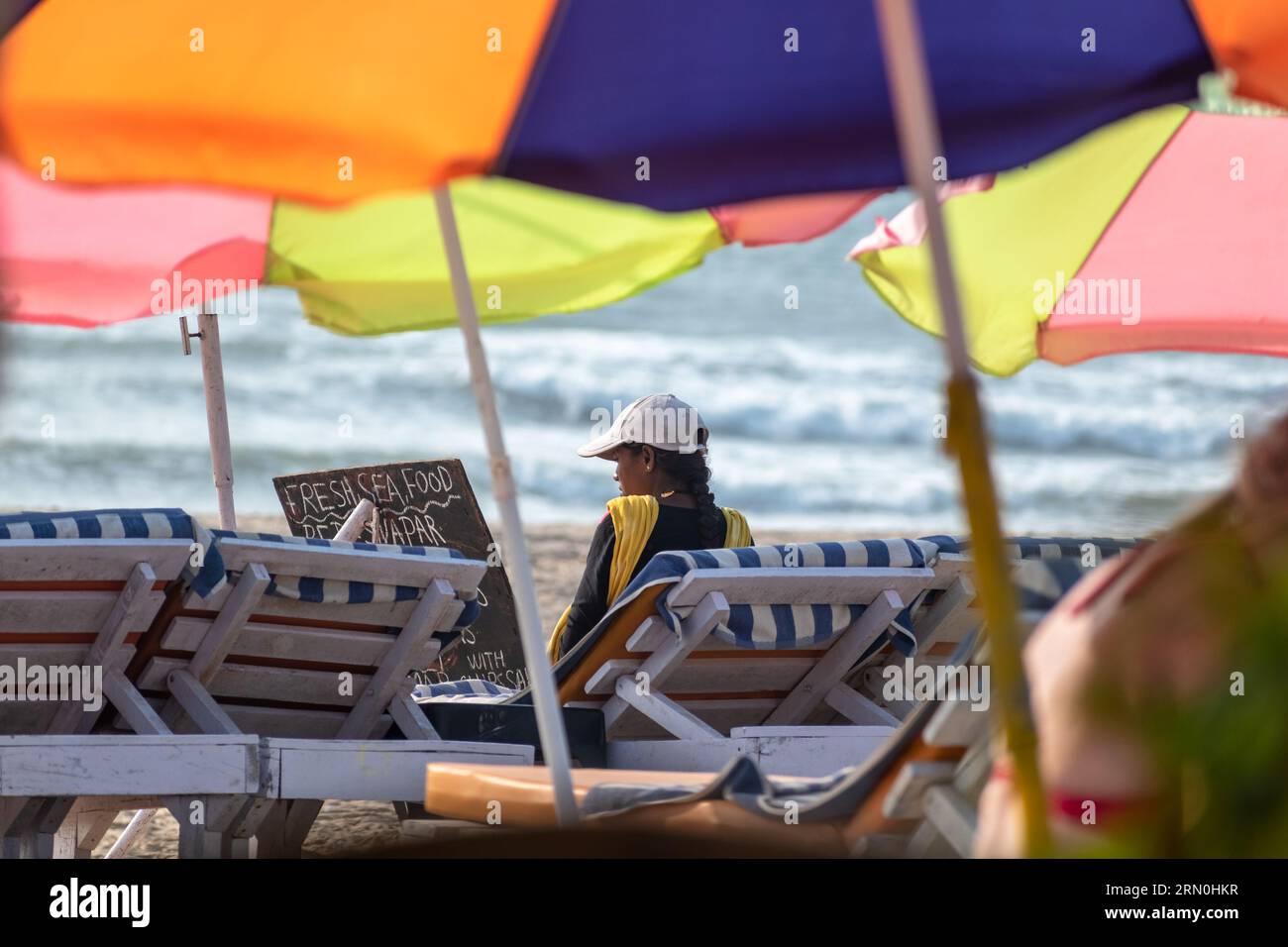 Calangute, Goa, India - January 2023: An Indian woman wearing a cap ...