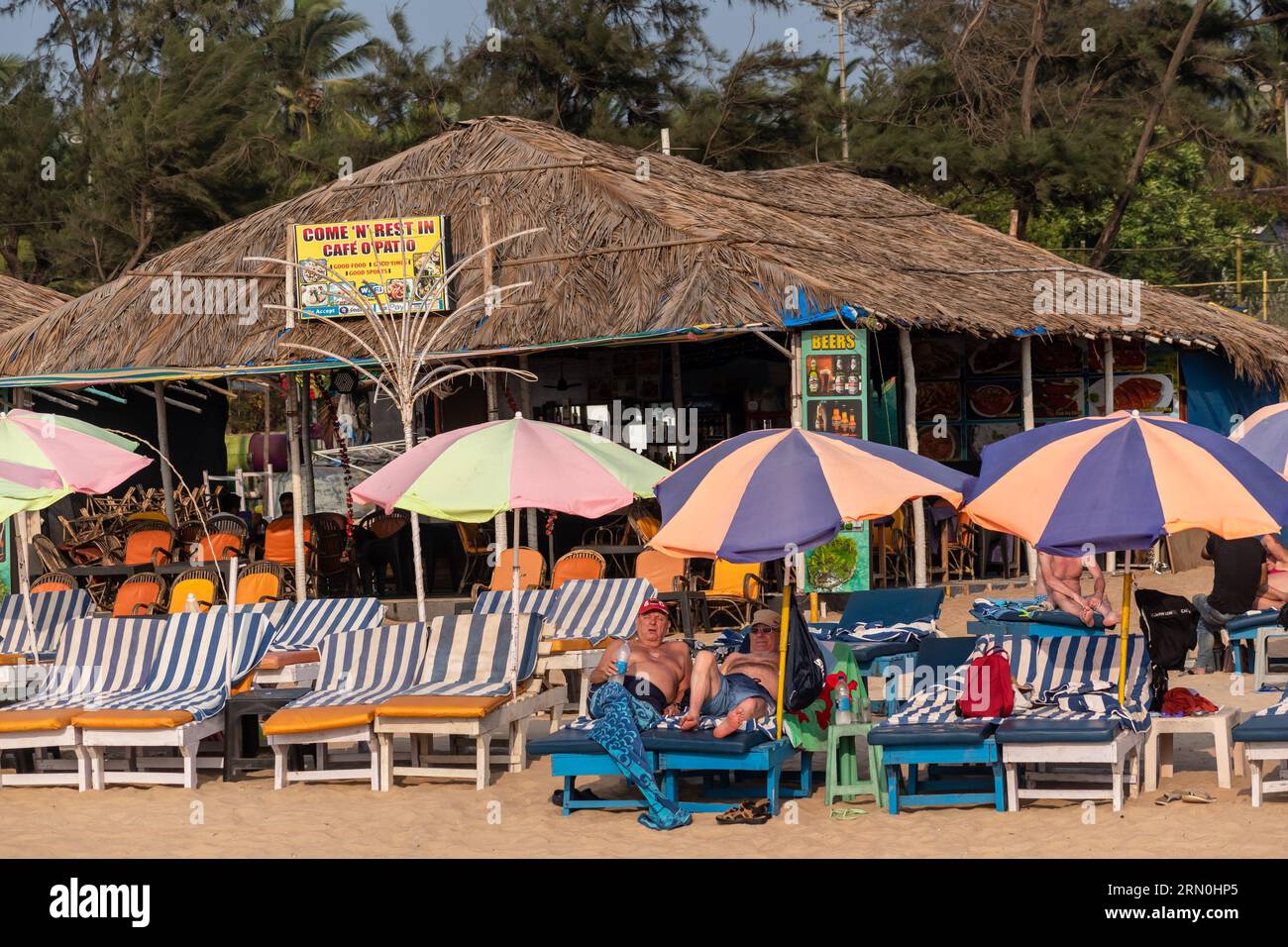 Calangute, Goa, India - January 2023: Caucasian tourists relaxing on ...
