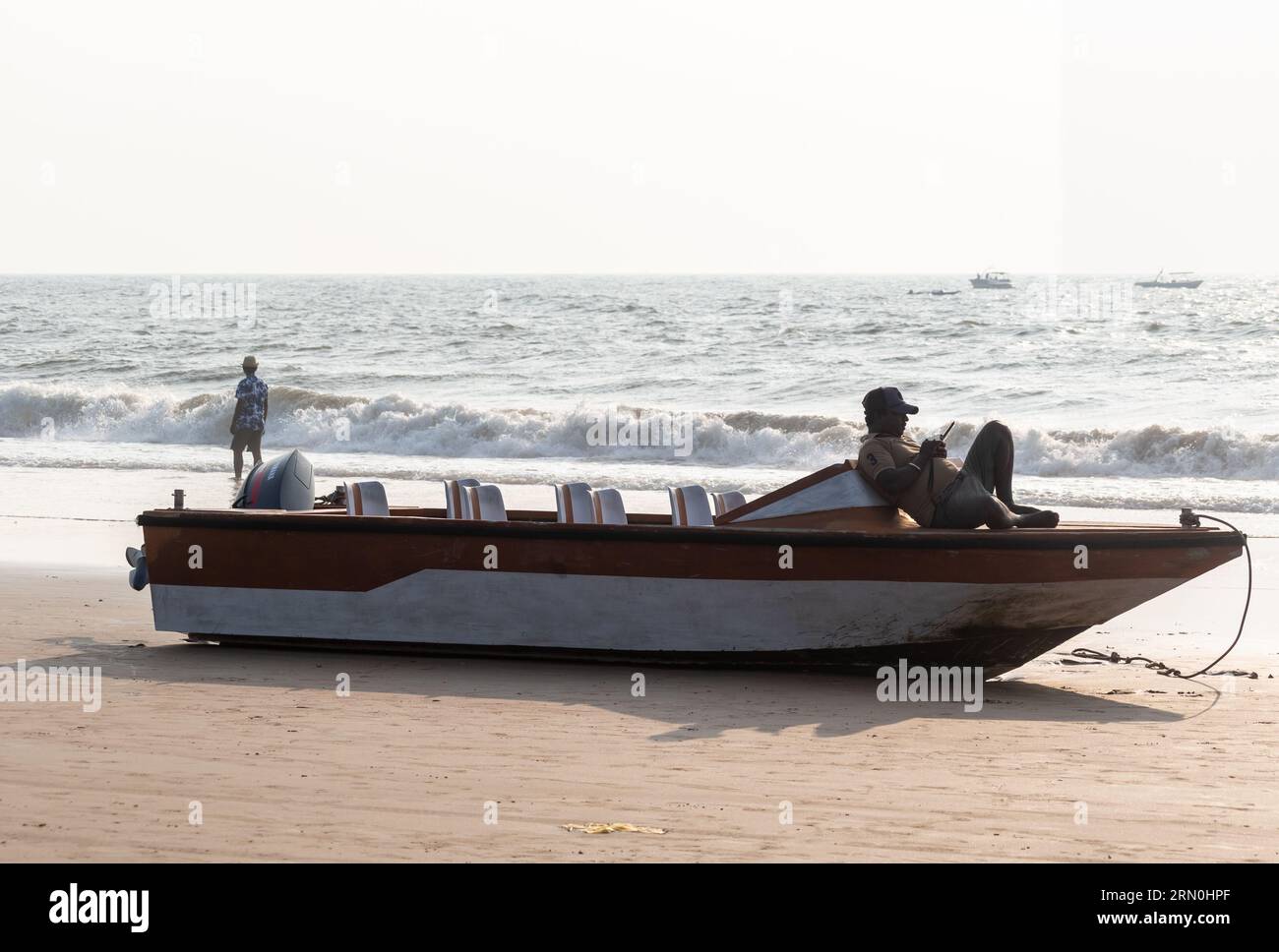 Indian fisherman boat phone sea hi-res stock photography and images - Alamy