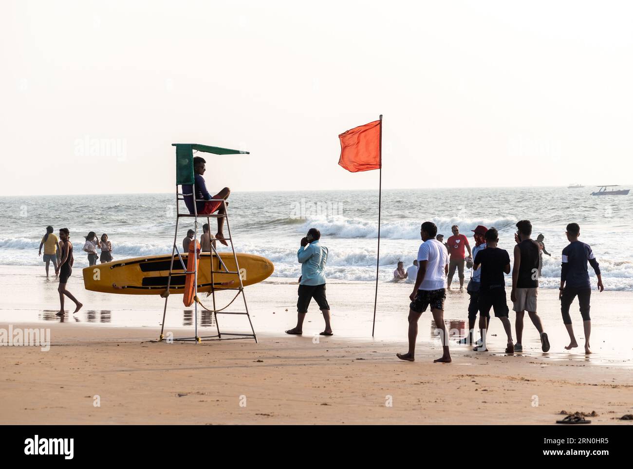 Calangute, Goa, India - January 2023: A lifeguard watching over a crowd ...