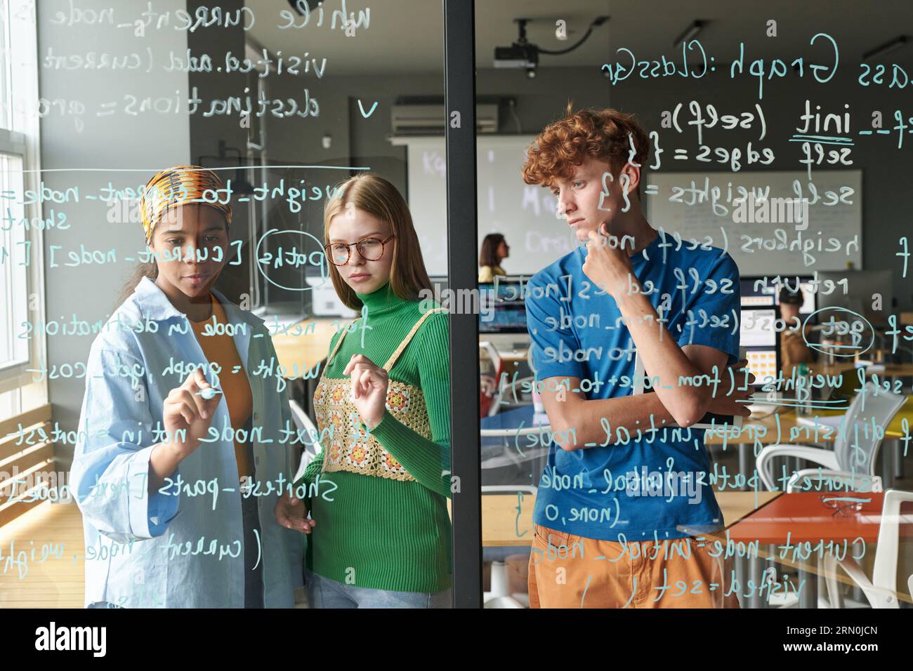 Group students looking glass hi-res stock photography and images - Alamy