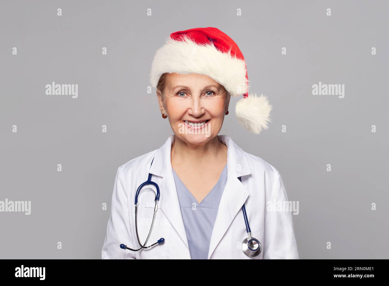 Mature female doctor santa hi-res stock photography and images - Alamy