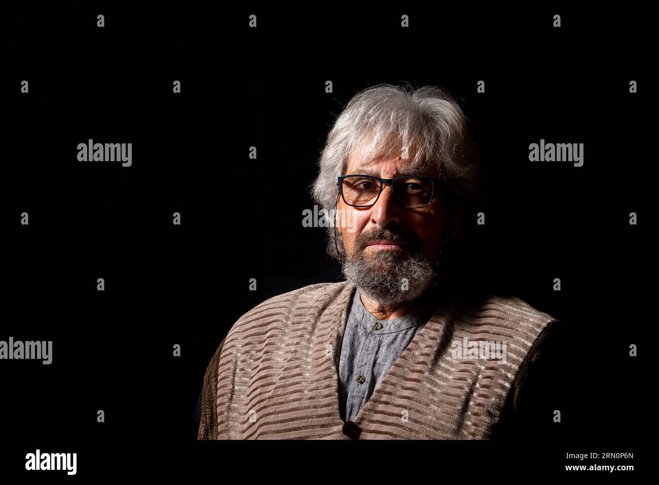 Older man wearing glasses Stock Photo - Alamy