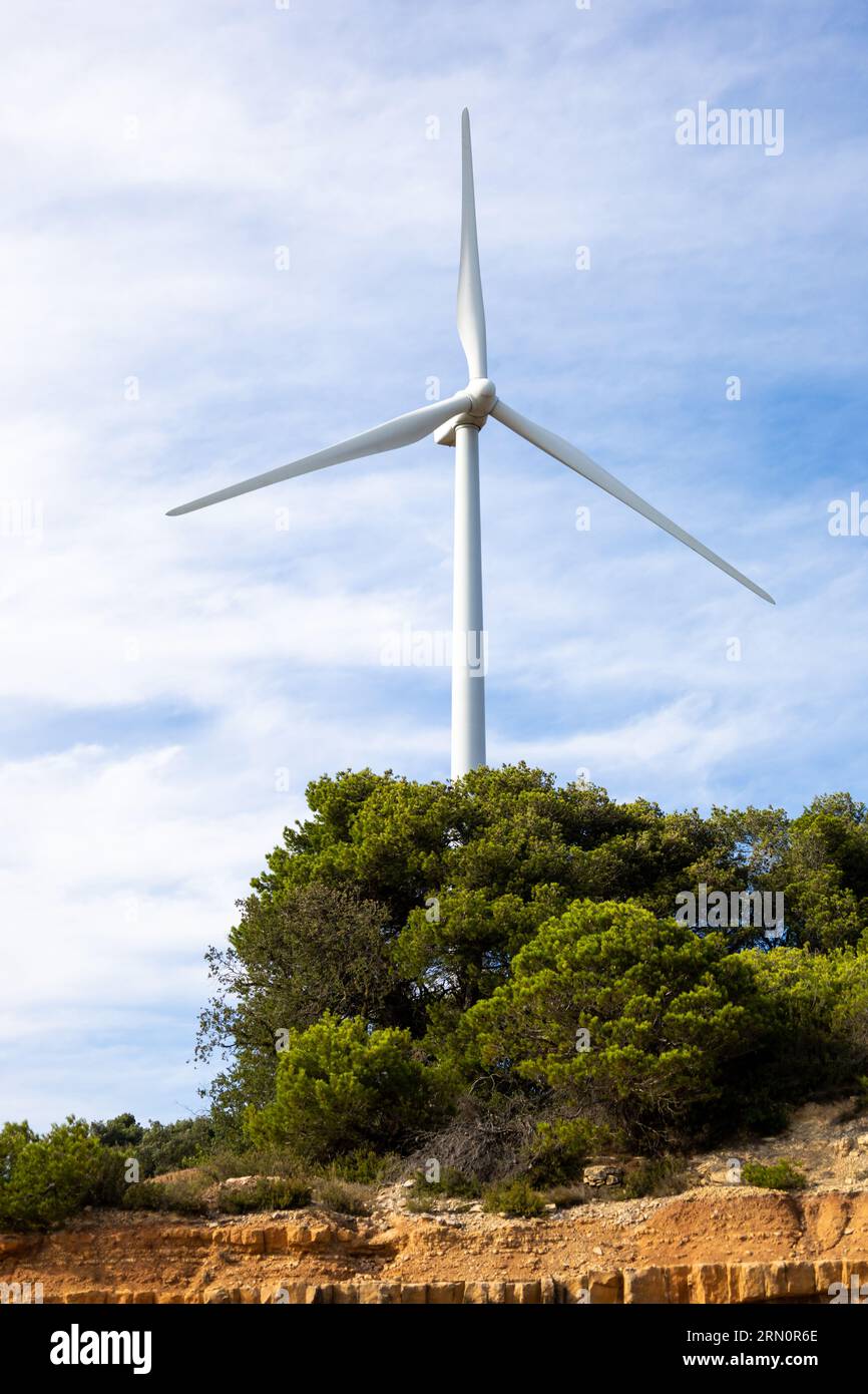 Single wind turbine tower in an eolic park in Spain. Windmills power ...