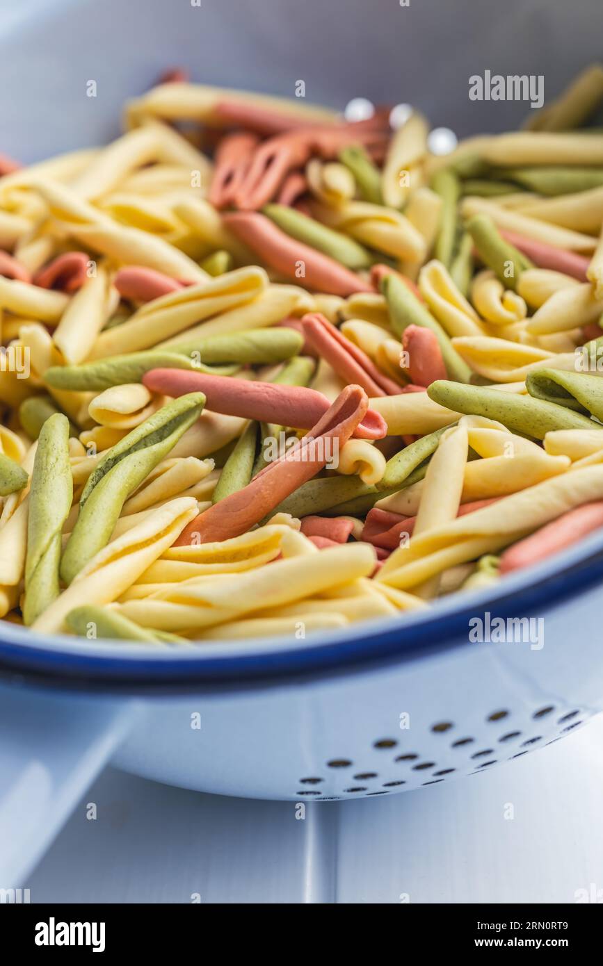 Fusilli pugliesi. Italian twisted pasta in the colander Stock Photo - Alamy