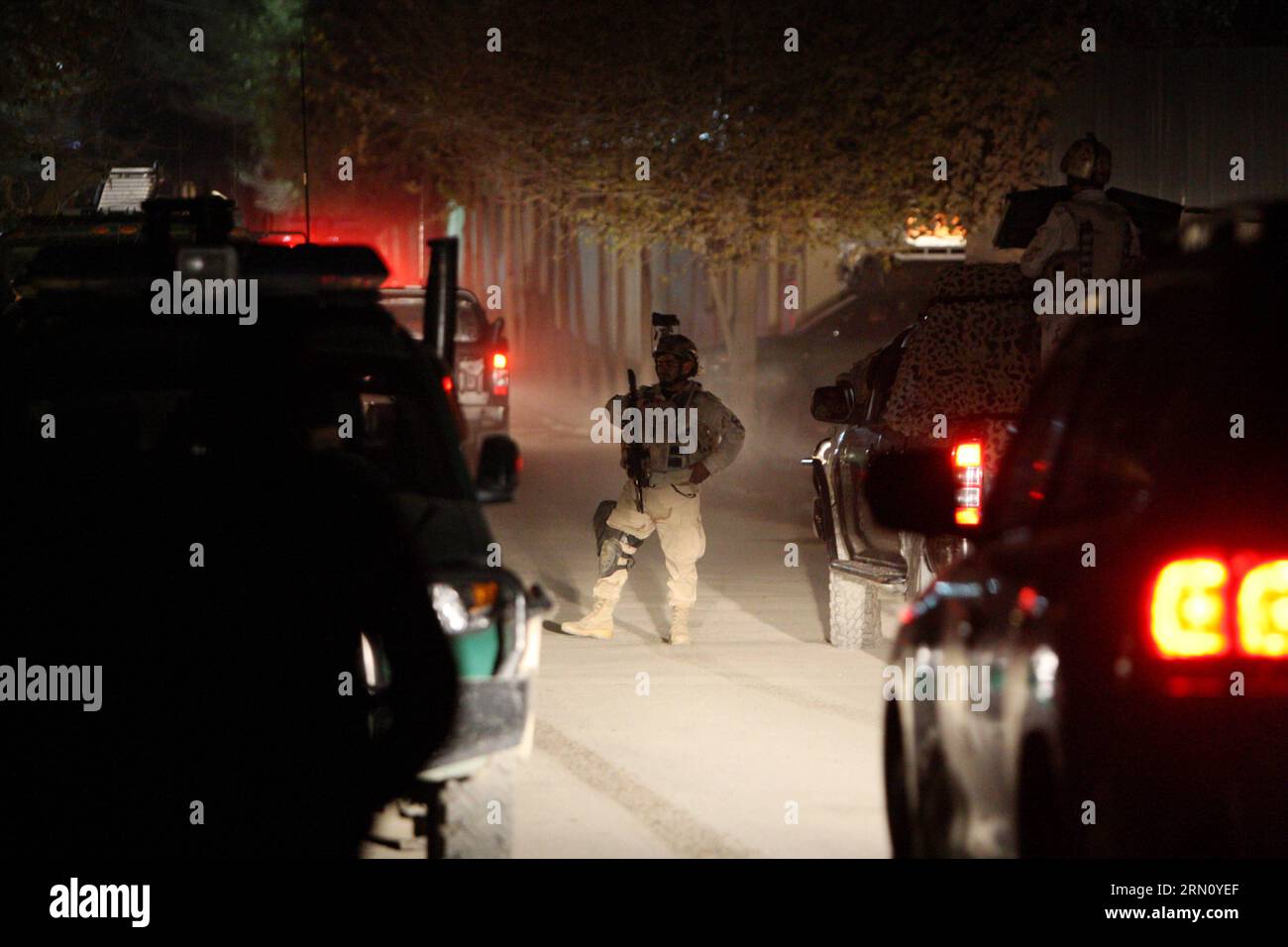 (141127) -- KABUL, Nov. 28, 2014 -- An Afghan policeman stands guard at ...
