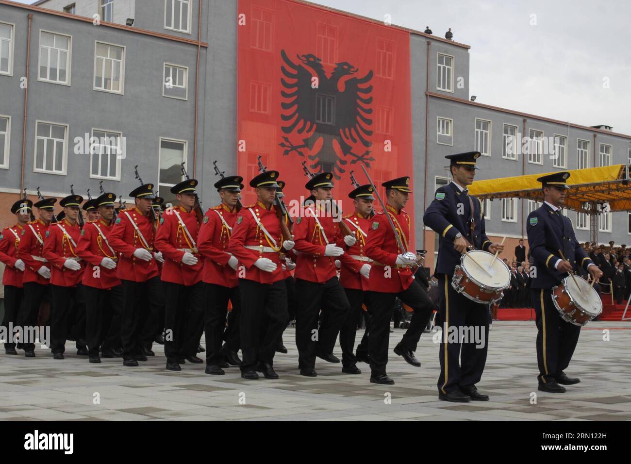 People participate in a parade, marking 70th anniversary of the ...