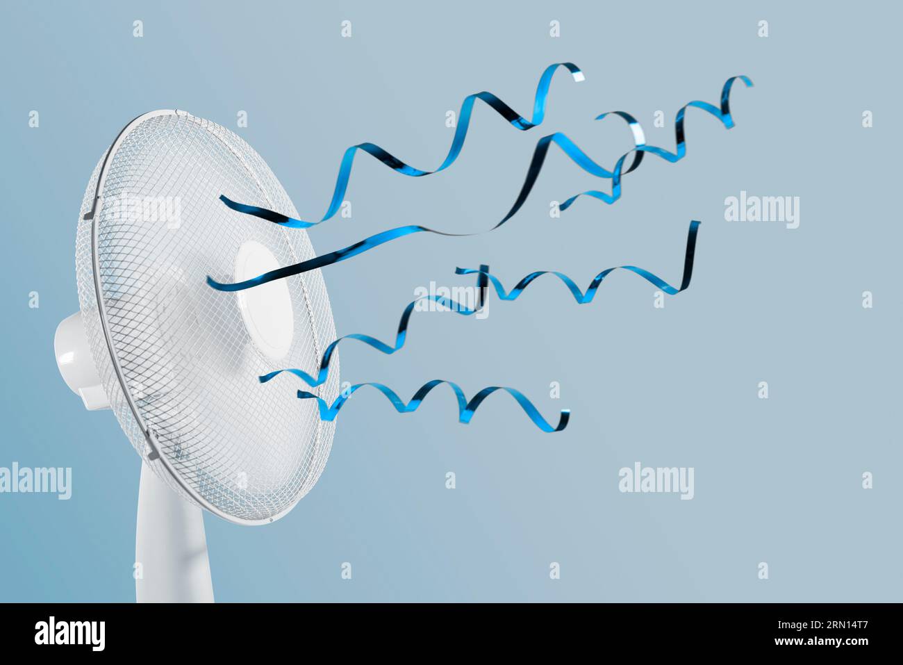 Portable electric fan with fluttering ribbons on blue background Stock ...