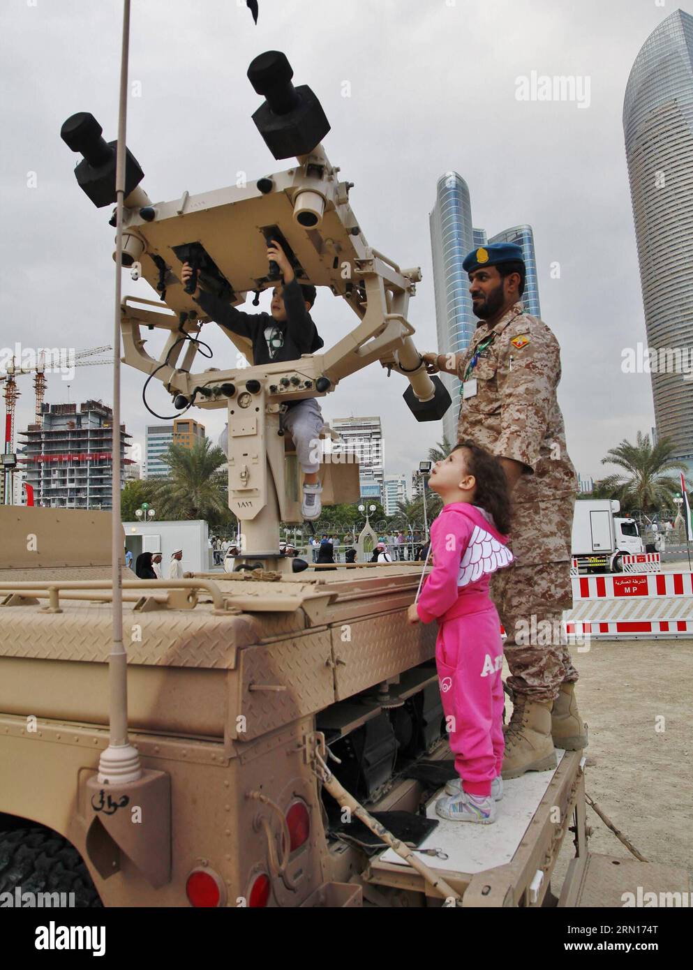 ABU DHABI, Dec. 1, 2014 -- A boy operates a military equipment during a ...