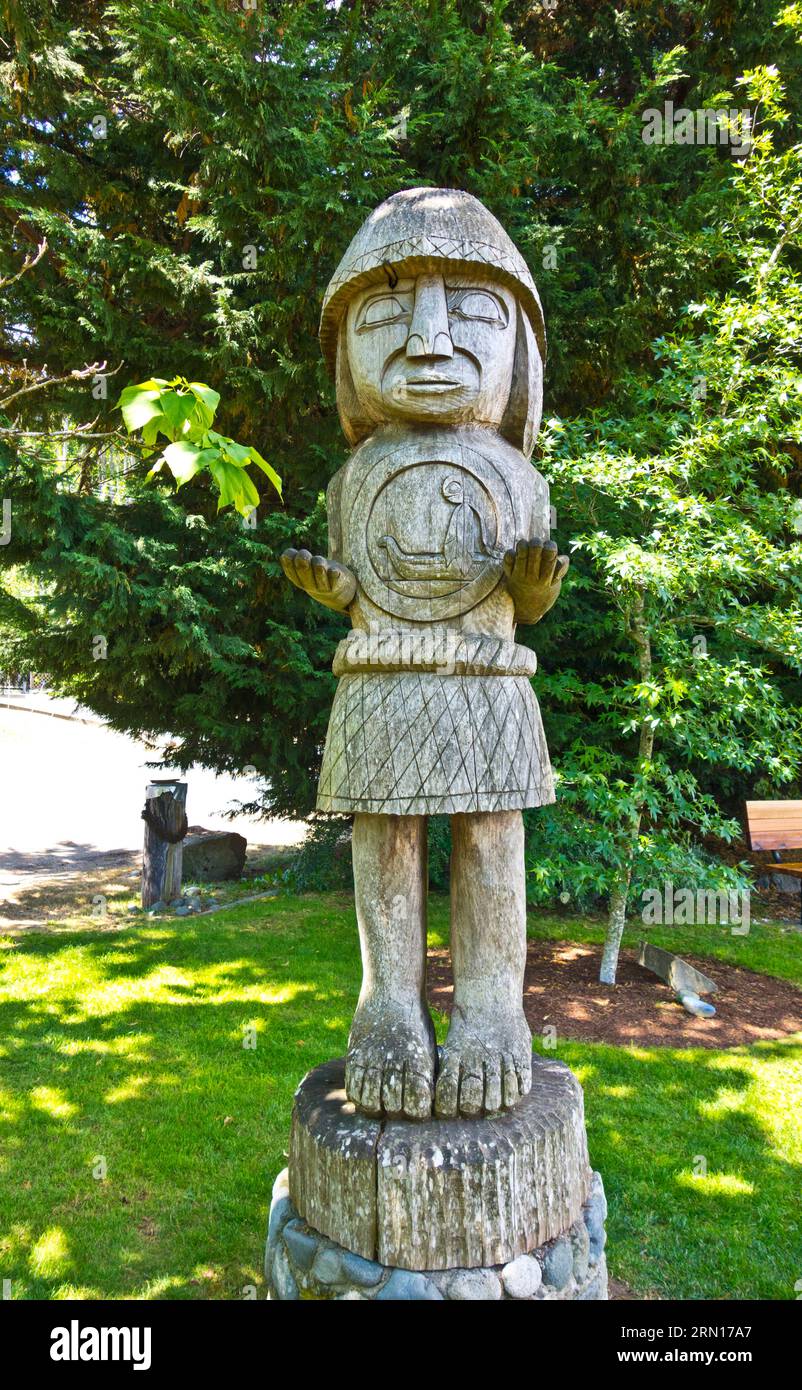 Salish Welcoming Figure, an Indigenous carving located in Cowichan Bay, British Columbia, Canada ...