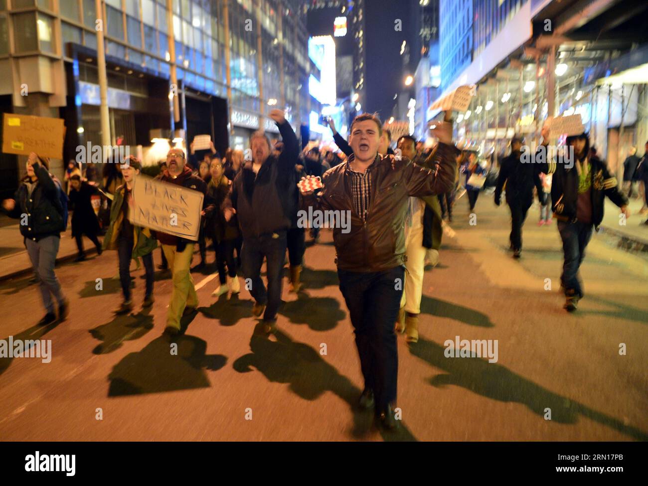 NEW YORK, Dec. 3, 2014 -- Protesters march at midtown Manhattan in New ...