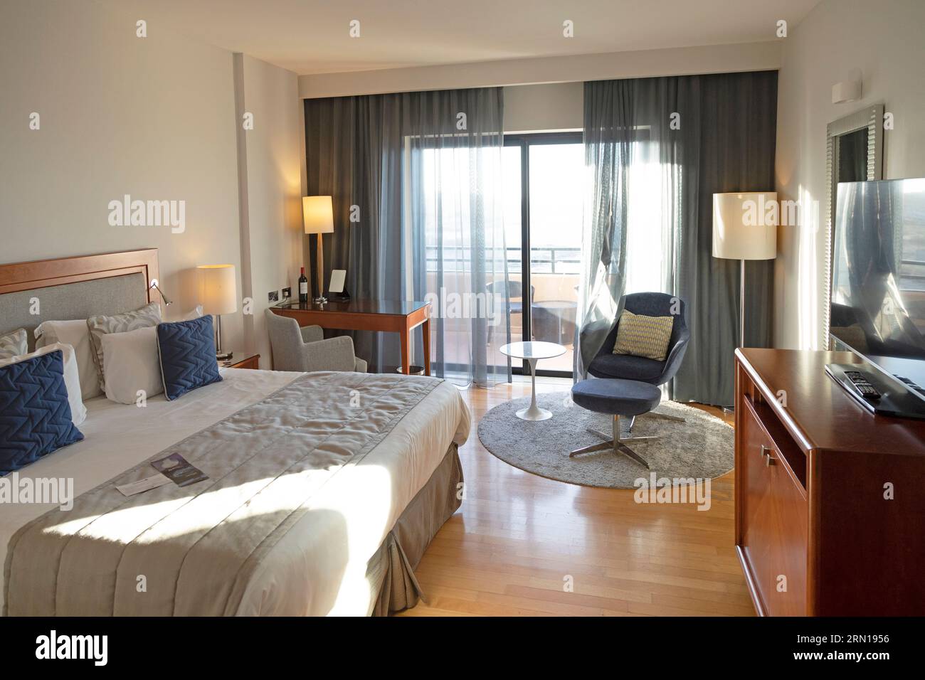 Hotel room at St Julian's in Malta. The room has a king-sized bed and a ...