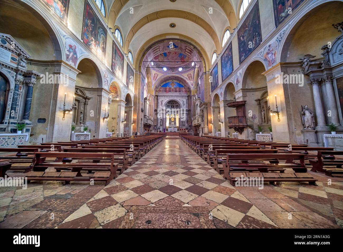 Altar and prayer benches inside the church Basilica del Carmine Stock ...