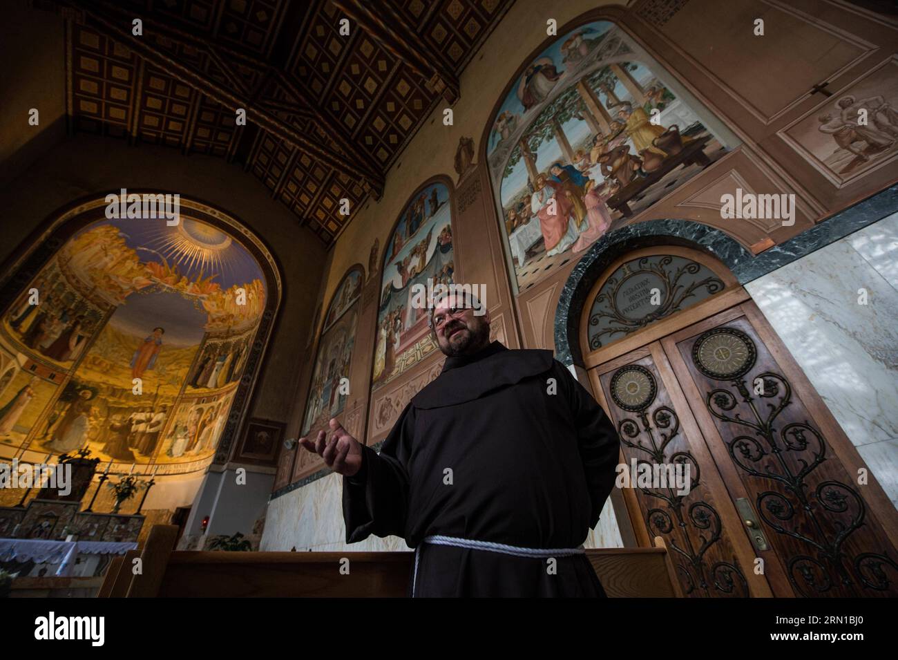 A father introduces the Church of the Visitation in Ein Karem ...
