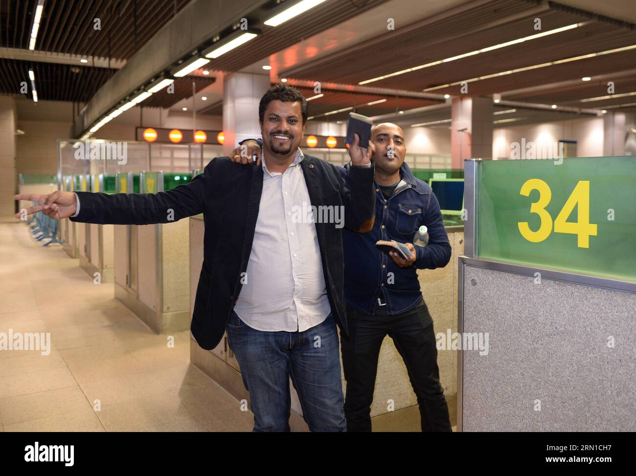 (141218) -- MACAO, Passengers go through a port connecting China s ...