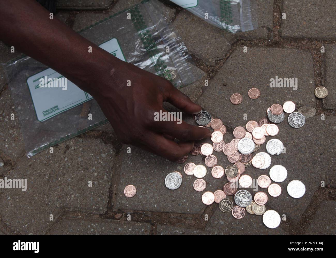 Zimbabwean bond coins hi-res stock photography and images - Alamy