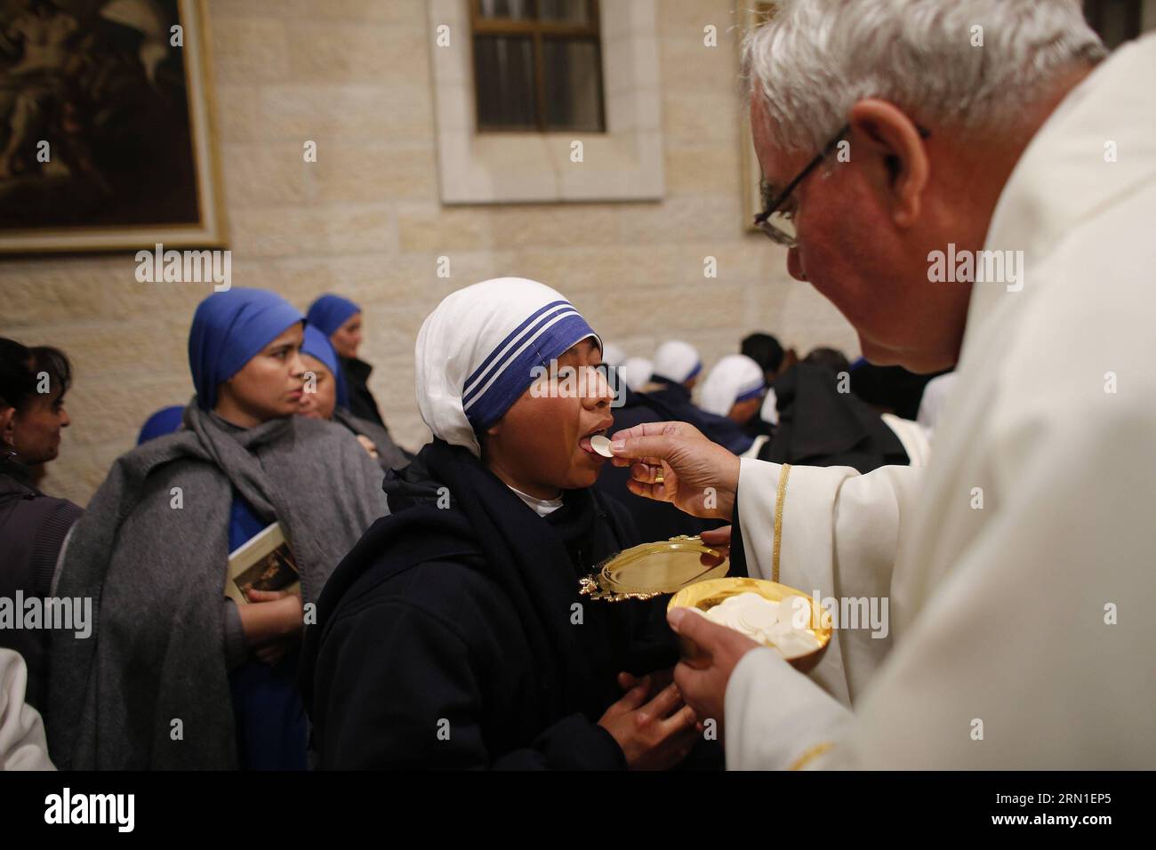 Receives communion hi-res stock photography and images - Alamy