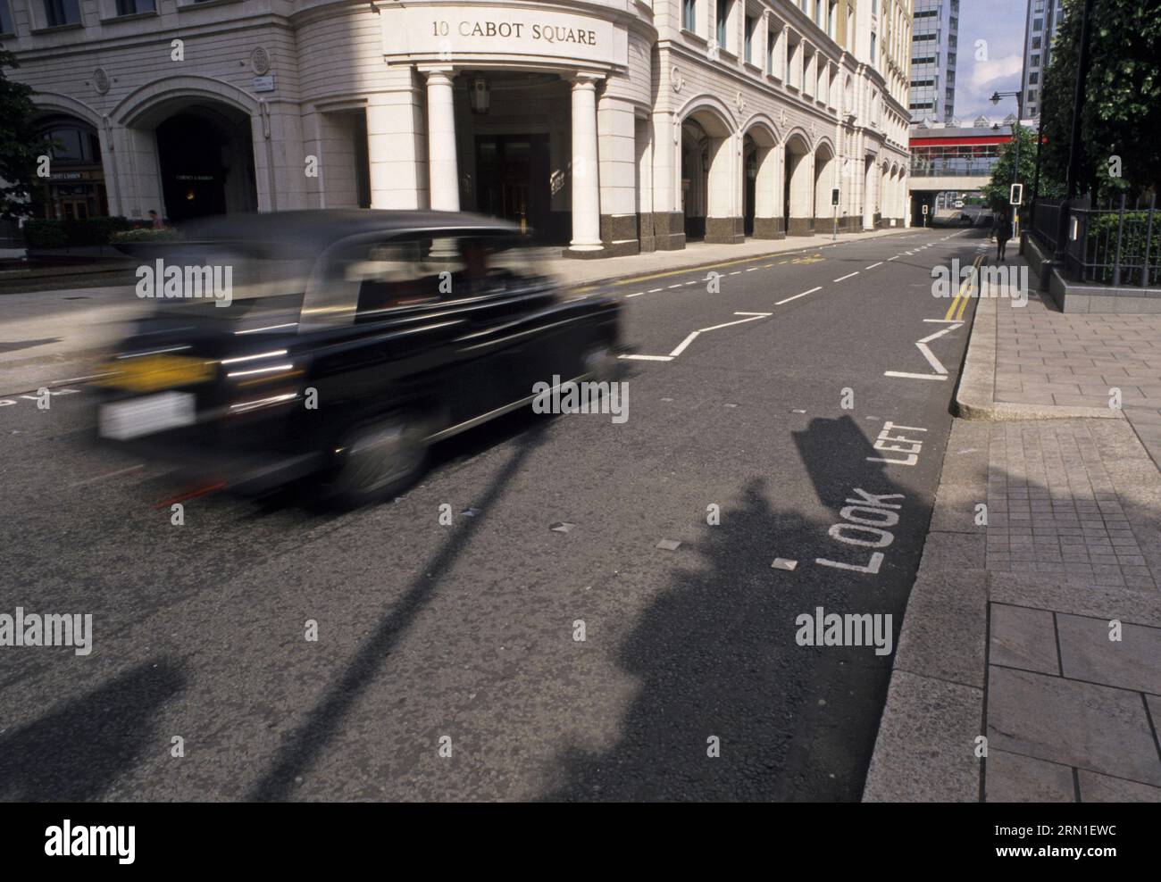 taxi goes fast in front of 10 Cabot Square, Canary Wharf, London ...