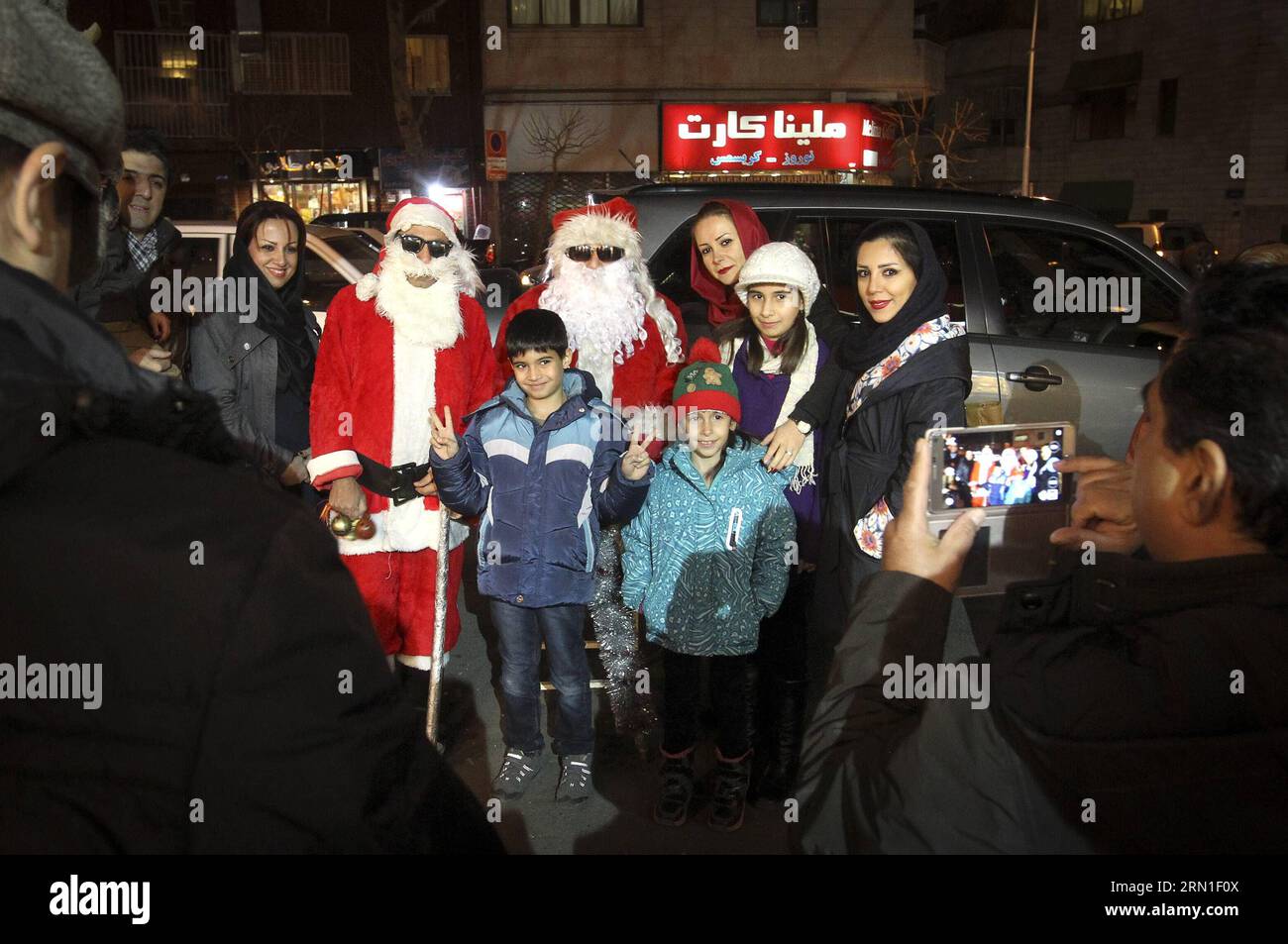 Two men dressed santa claus hi-res stock photography and images - Alamy