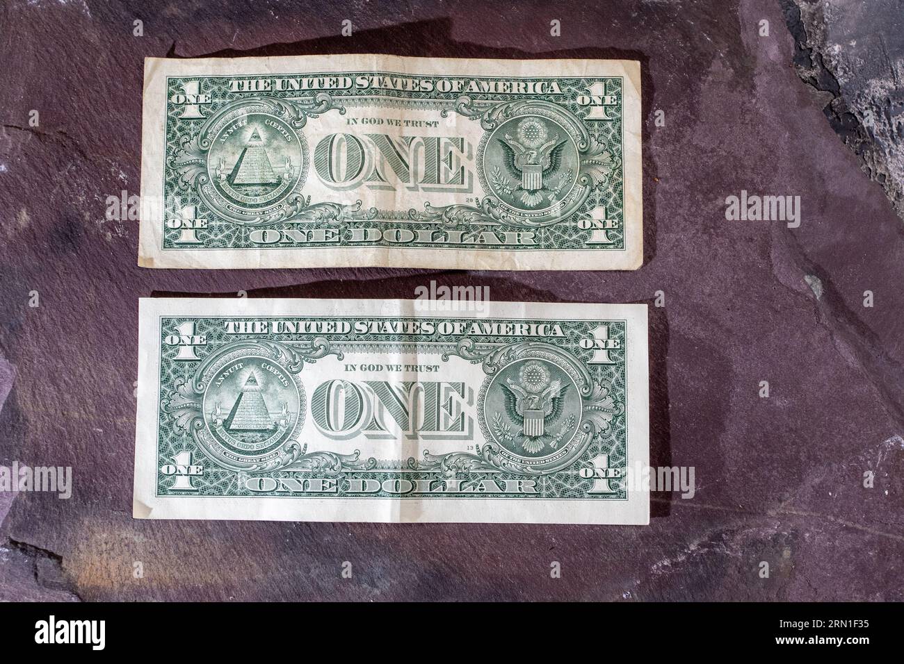 The reverse of two American one dollar bills Stock Photo - Alamy